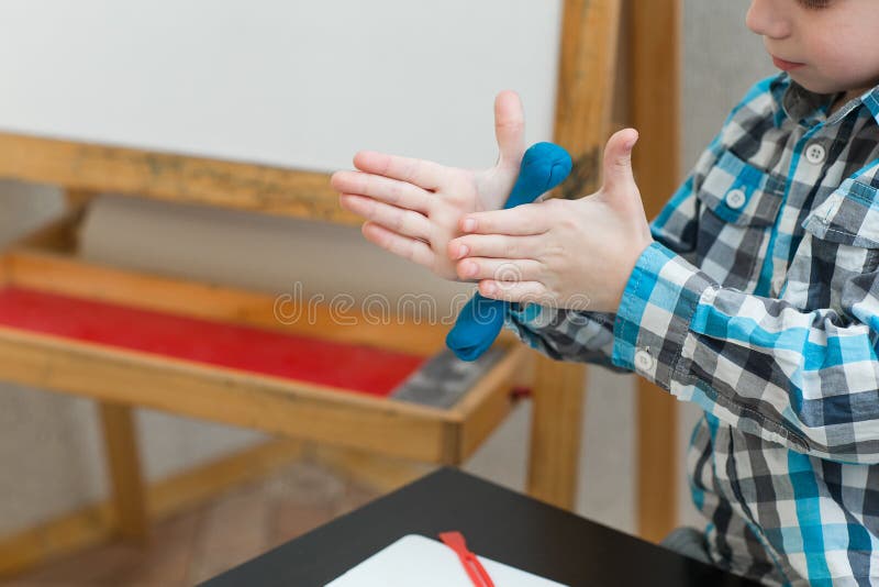 Boy Sculpts from Plasticine at Home Stock Photo - Image of craft ...