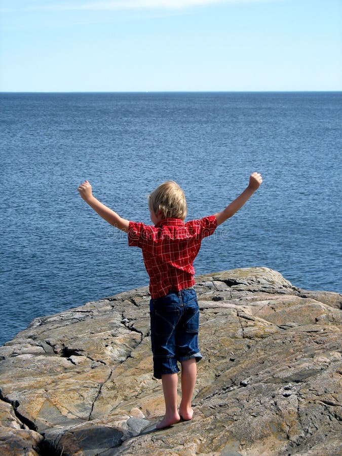 Boy at sea stock image. Image of summer, success, kids - 1037923