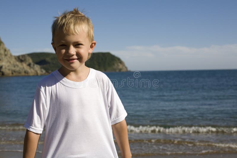 Boy and sea stock image. Image of outdoor, blond, laugh - 11977403