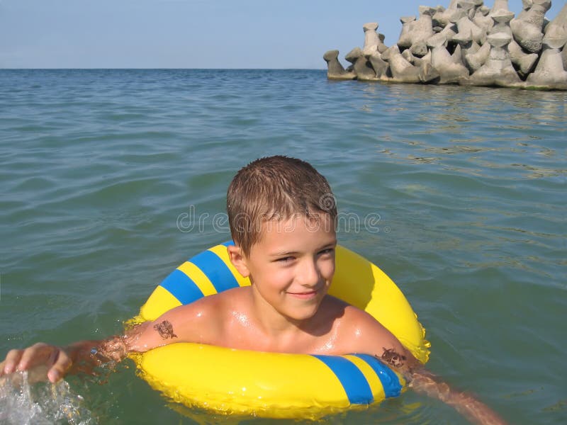 Boy in the sea stock image. Image of pleasure, dive, summer - 1503383