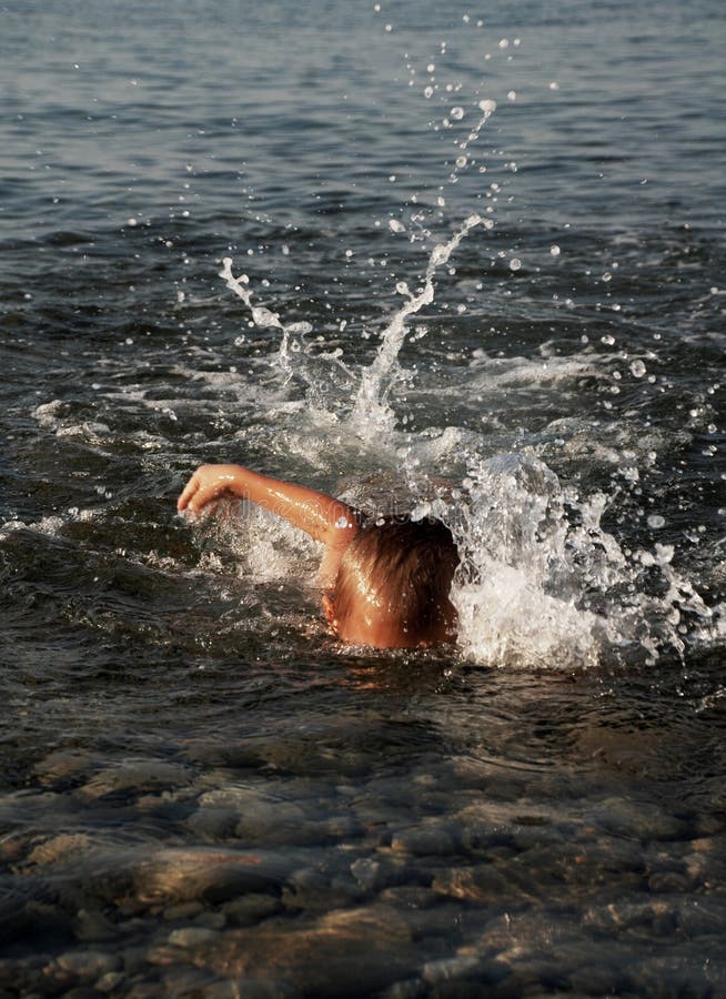 The boy in the sea stock photo. Image of freedom, enjoyment - 2961720