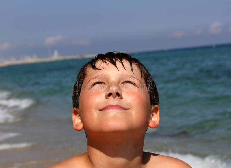 Boy on the sea stock photo. Image of beach, face, enjoy - 39640182