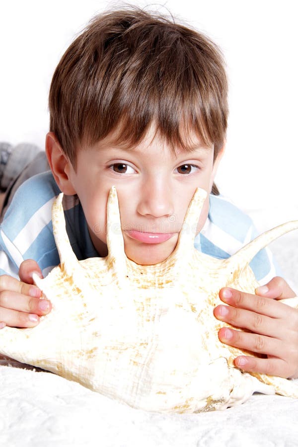 Boy with Sea Shell Over White Stock Photo - Image of people, human ...