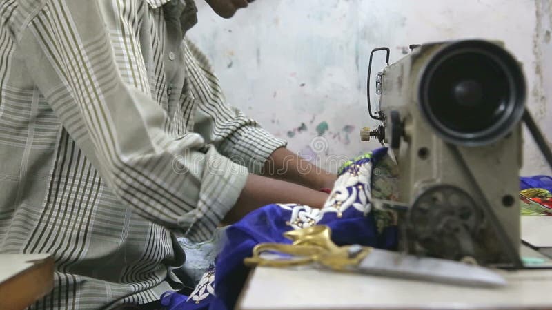Boy Sewing Clothes on a Machine in Mumbai. Stock Video - Video of sewer ...
