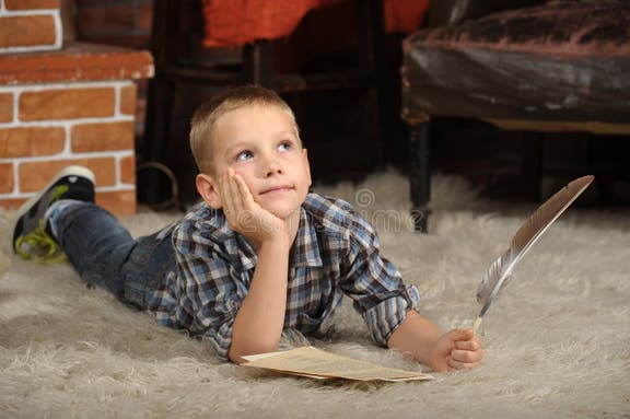 Boy with a quill pen stock photo. Image of framing, glasses - 30083882