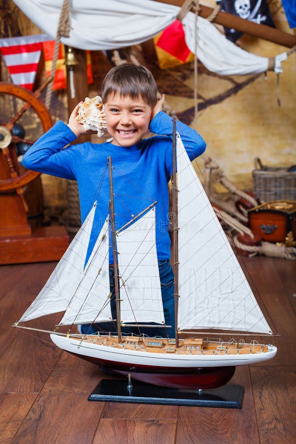 Boy with ship stock image. Image of captain, buccaneer - 51387573