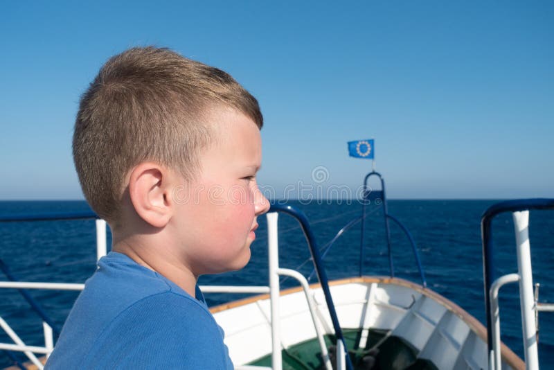 Boy on a ship sets sail stock image. Image of happy - 227883931
