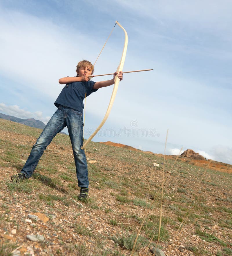 Boy Shoots a Bow at a Target Stock Image - Image of nature, shooter ...