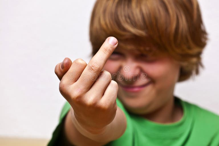 Boy showing his finger stock photo. Image of expression - 62734490