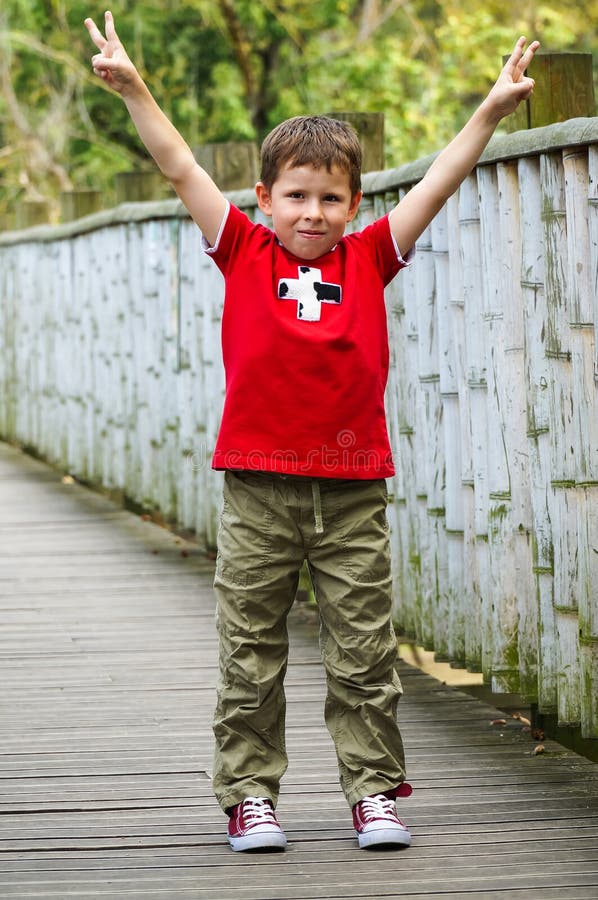 Boy showing victory sign stock image. Image of emotion - 45520221