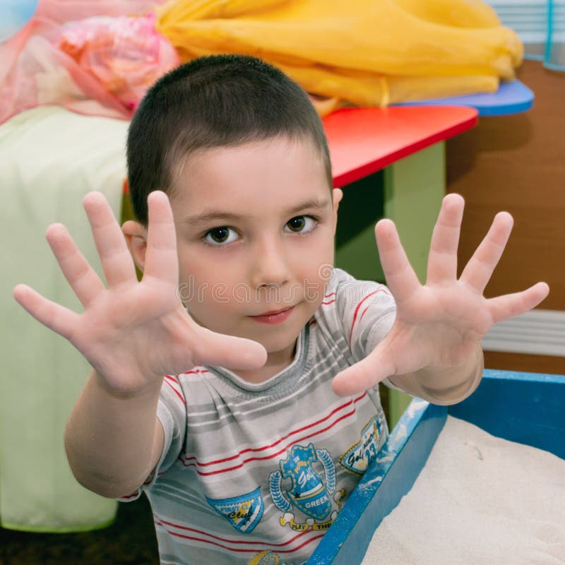 A boy shows hands stock photo. Image of recreation, caring - 47601756