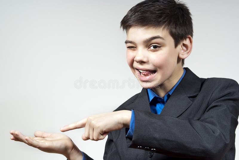 Boy shows his hand stock photo. Image of play, gray, boys - 23590402