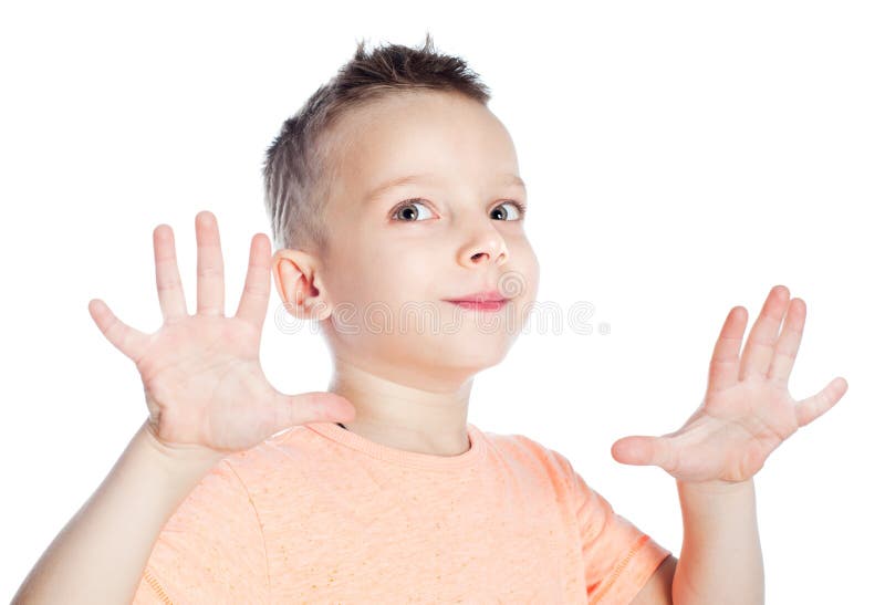 A boy shows his hand stock photo. Image of childhood - 27474666