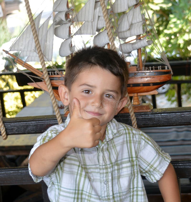 Boy shows OK stock photo. Image of thumb, positiv, sign - 61434852