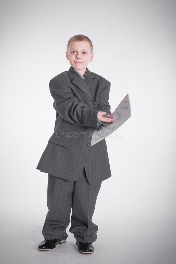 Boy looks on paper stock image. Image of learn, human - 30363295