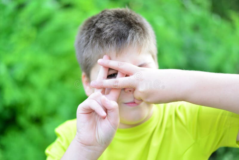 Boy Shows Sign Gesture Prison Bars Outdoors Stock Photo - Image of ...