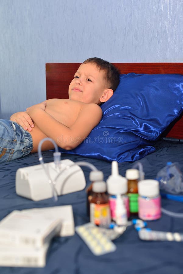 Boy with a sick stomach stock image. Image of hand, face - 158593505