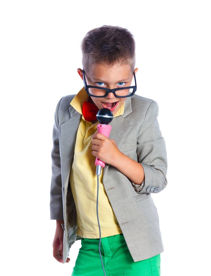Boy Singing with a Microphone Stock Image - Image of pillow, musician ...