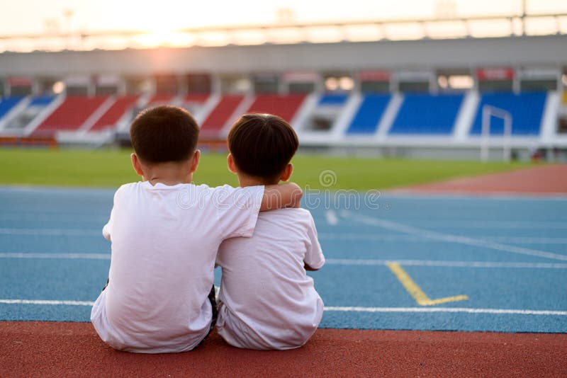 Boy Lay On The Running Track Stock Photo - Image of competition, happy ...