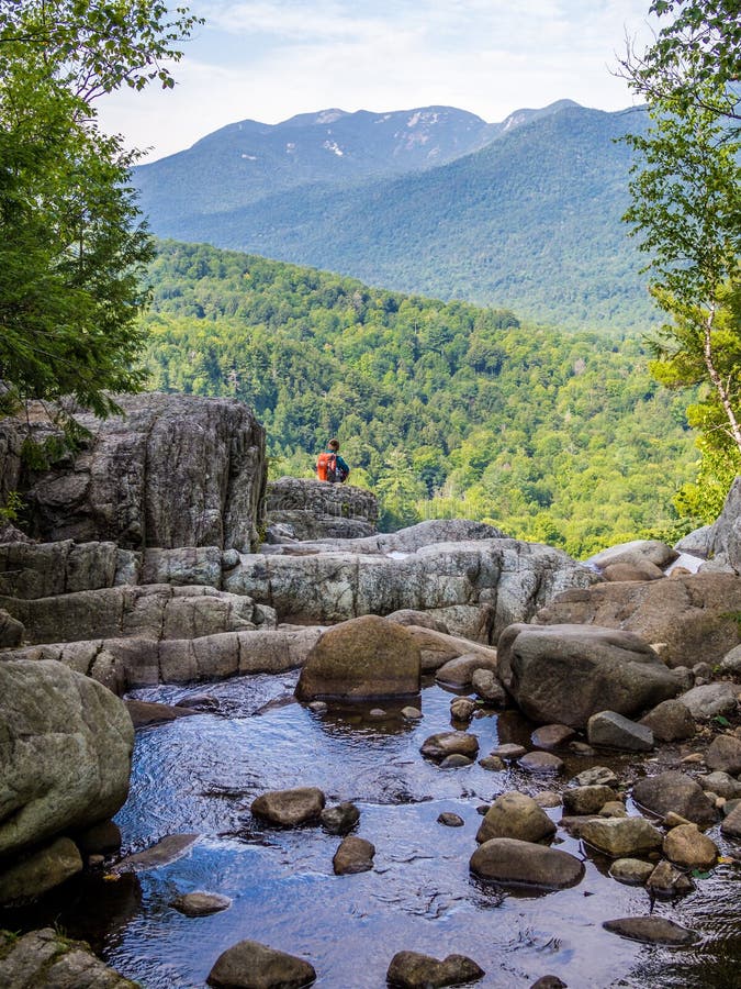 Boy Sits at the Edge of the Cliff Editorial Photography - Image of ...