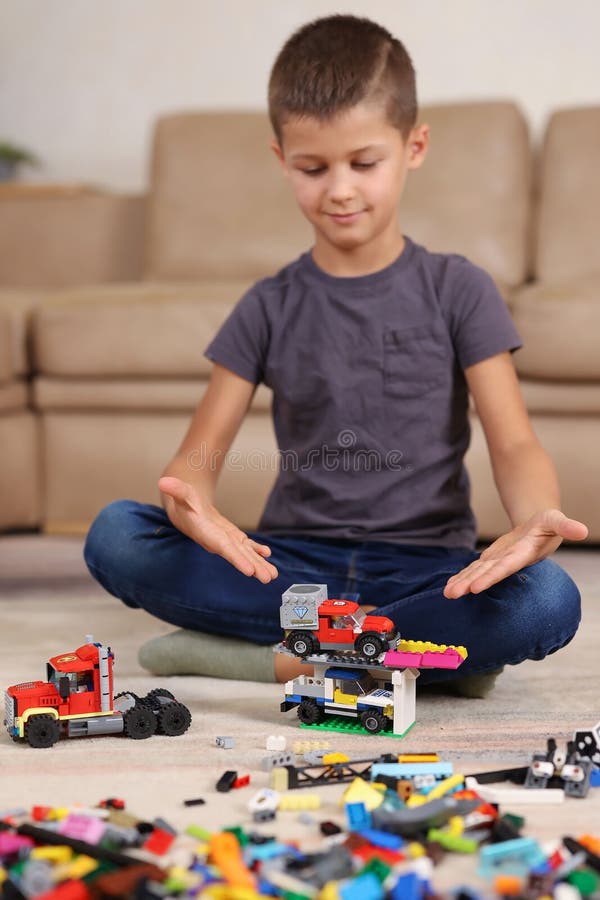 The Boy Sits and Shows His Work Stock Photo - Image of demonstrates ...