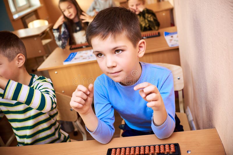Happy Boy Studing at Mental Arithmetic School. Education and ...