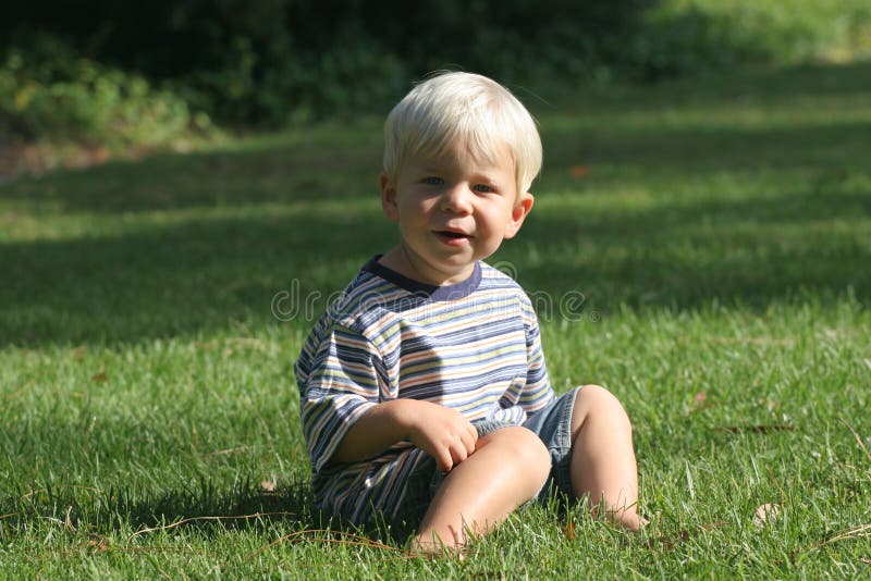 Boy sitting stock image. Image of summertime, youth, sitting - 10272537