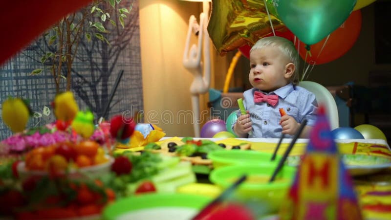 Boy Sitting at the Banquet Table with the Stock Footage - Video of ...