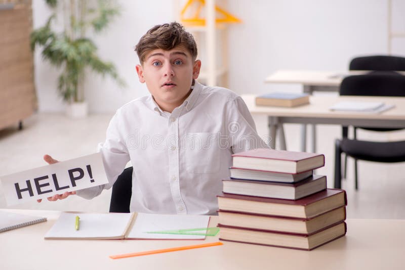 Boy Sitting in the Classrom Stock Image - Image of student, preparing ...