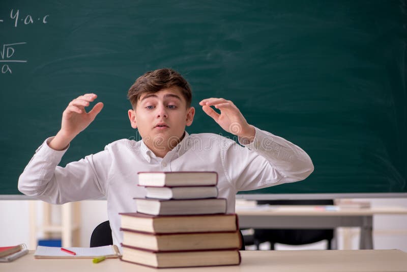Boy Sitting in the Classrom Stock Photo - Image of class, college ...