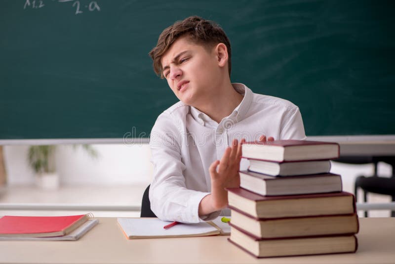Boy Sitting in the Classrom Stock Photo - Image of preparation ...