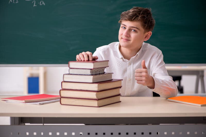 Boy Sitting in the Classrom Stock Image - Image of learning, college ...