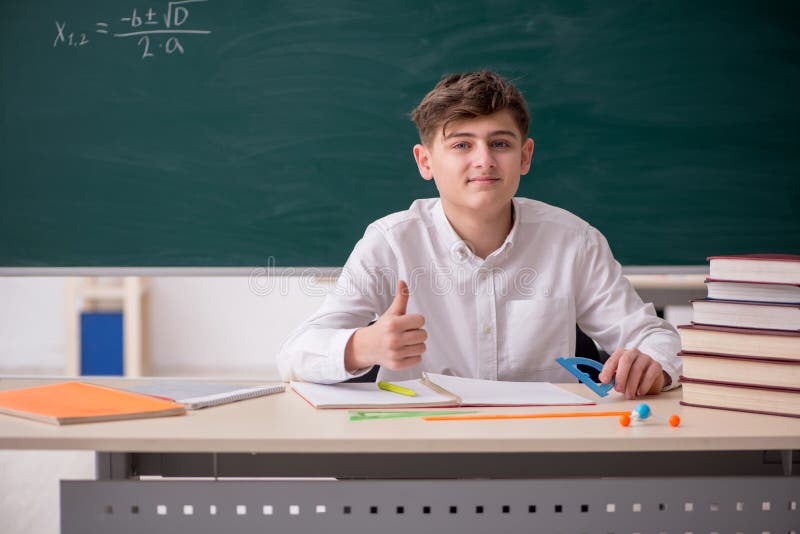 Boy Sitting in the Classrom Stock Image - Image of learning, college ...
