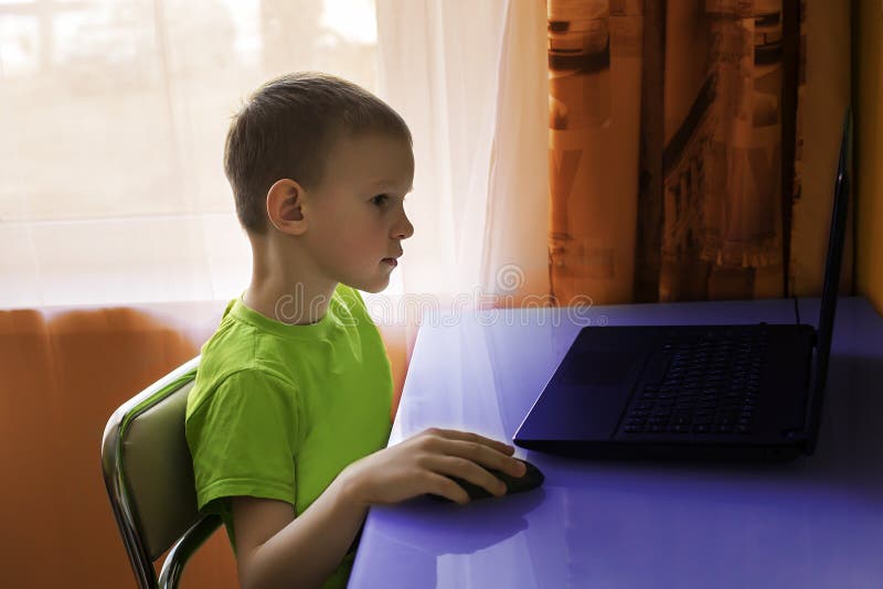 Boy is Sitting at the Computer Stock Photo - Image of play, hand: 115246684
