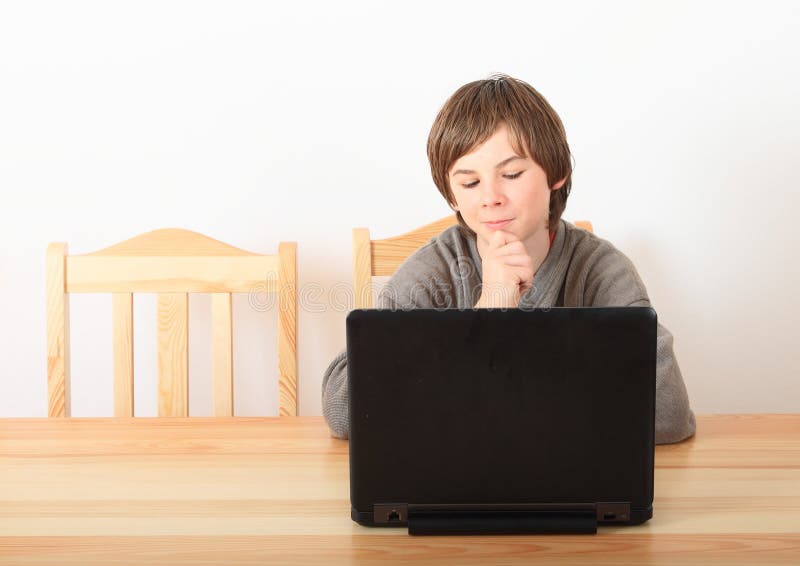 Boy Sitting with a Computer Stock Image - Image of chairs, comp: 48807979