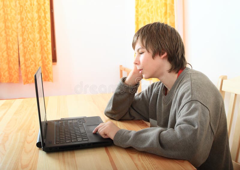 Boy Sitting with a Computer Stock Photo - Image of computer, barefooted ...