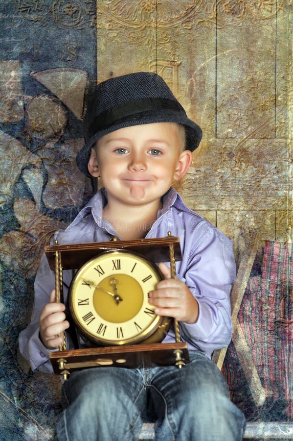 Boy Sitting Holding Clocks in the Hands of a Waiting Midnight Stock ...