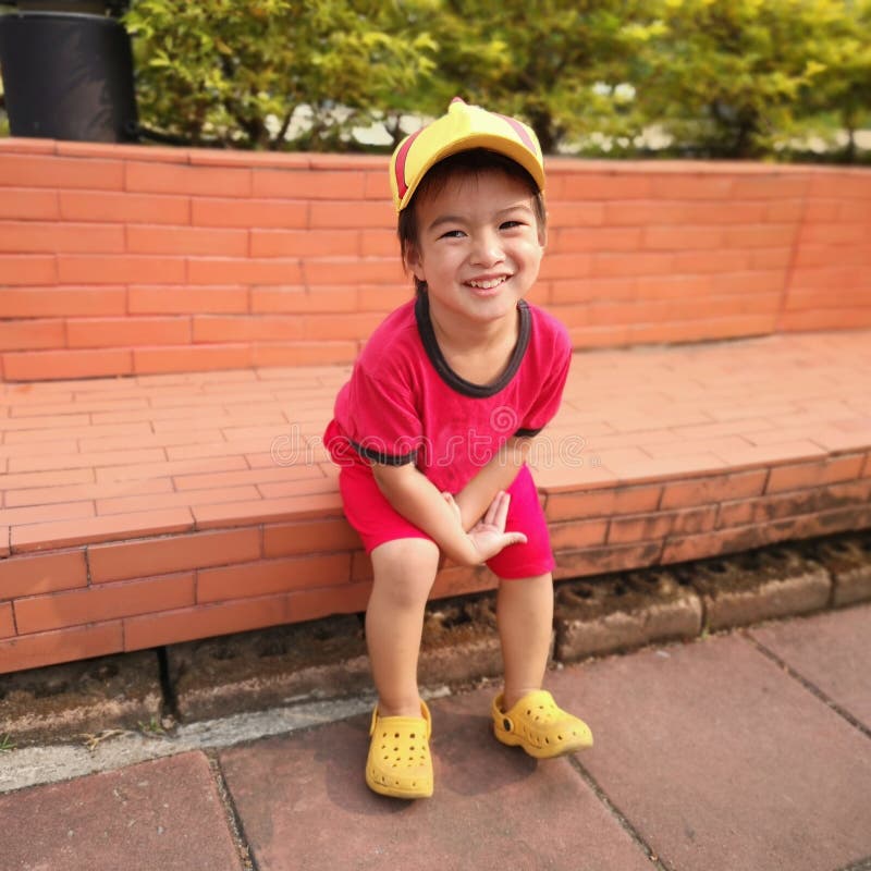 The boy is sitting. stock image. Image of childhood - 143414593