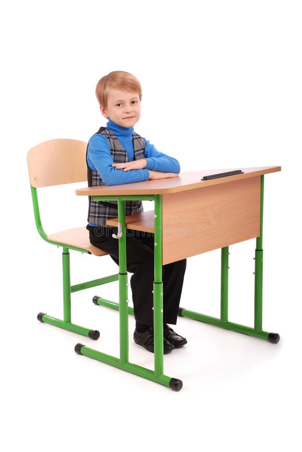 Boy Sitting at a School Desk Stock Image - Image of people, book: 64000695