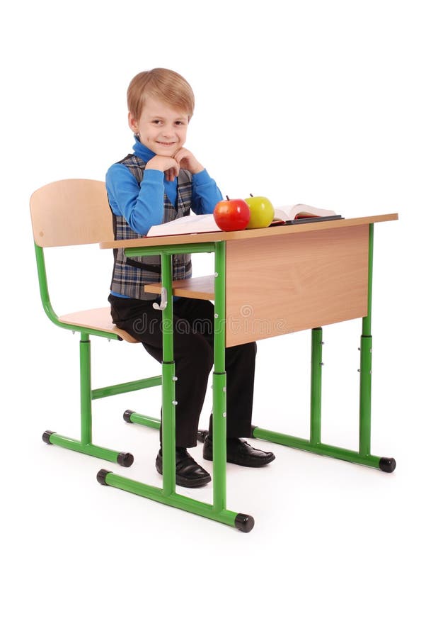 Boy Sitting at a School Desk Stock Image - Image of child, hand: 70436037