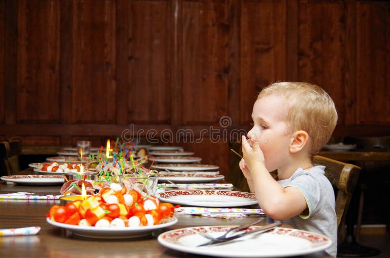 Boy sitting at the table stock photo. Image of schoolboy - 282798880