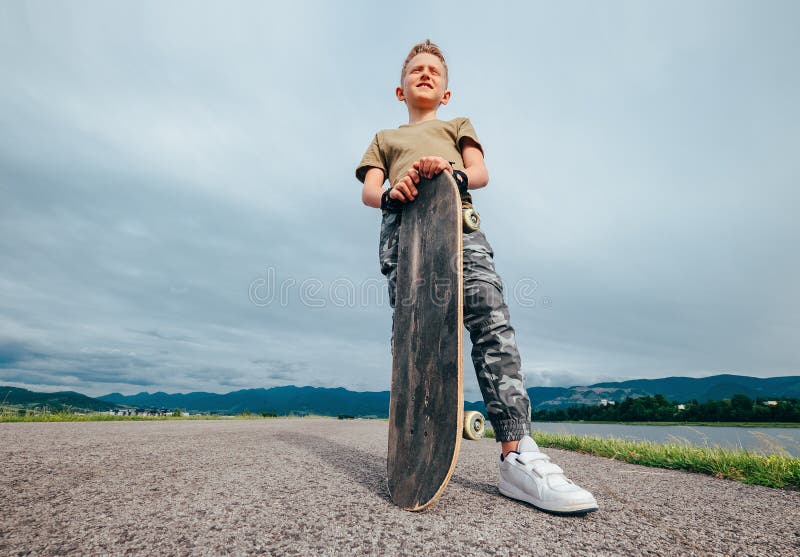 Boy with skateboard stock photo. Image of skateboarder - 94636424