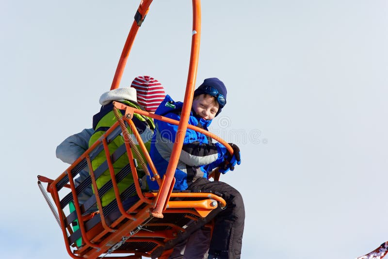 Family chair lift fun stock image. Image of high, tourists - 18476695