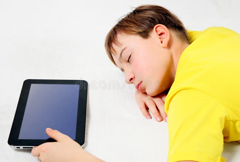 Boy sleep with a Tablet stock image. Image of room, rest - 225782225