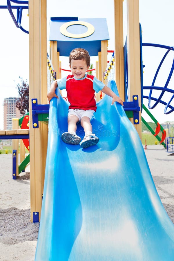 Boy on a slide stock image. Image of enjoy, smiling, happy - 23820127