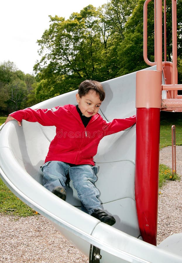 Boy on a slide stock image. Image of children, happy, playful - 5168443