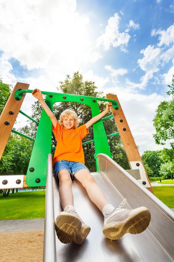 Boy and Girl Behind Hug on Chute with Smile Stock Photo - Image of ...