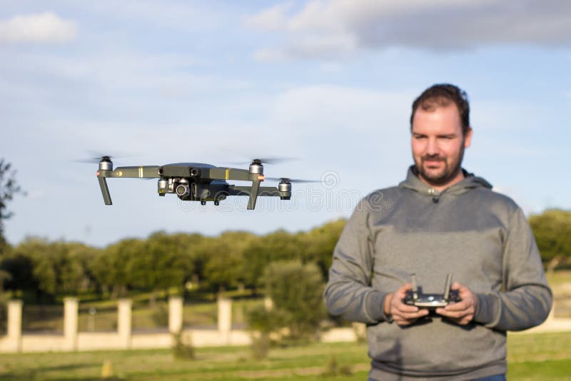 Boy Smiling As a Drone Flies in Front of Him Editorial Stock Photo ...