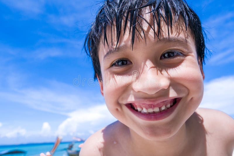 A boy smiling stock photo. Image of coast, relaxation - 95801276
