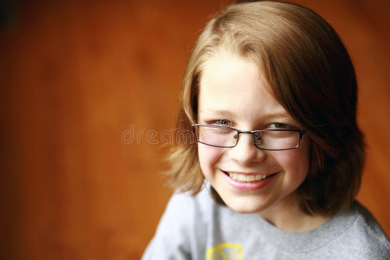 Boy Smiling with Eyeglasses Stock Image - Image of natural, hair: 27662403